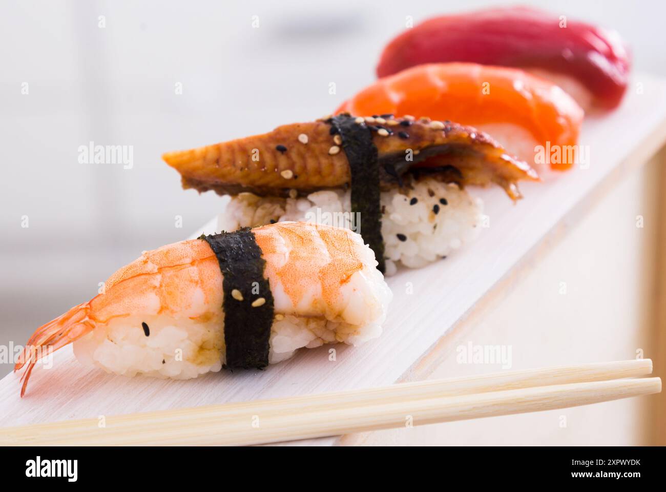 Series of four kinds Nigirisushi Stock Photo - Alamy