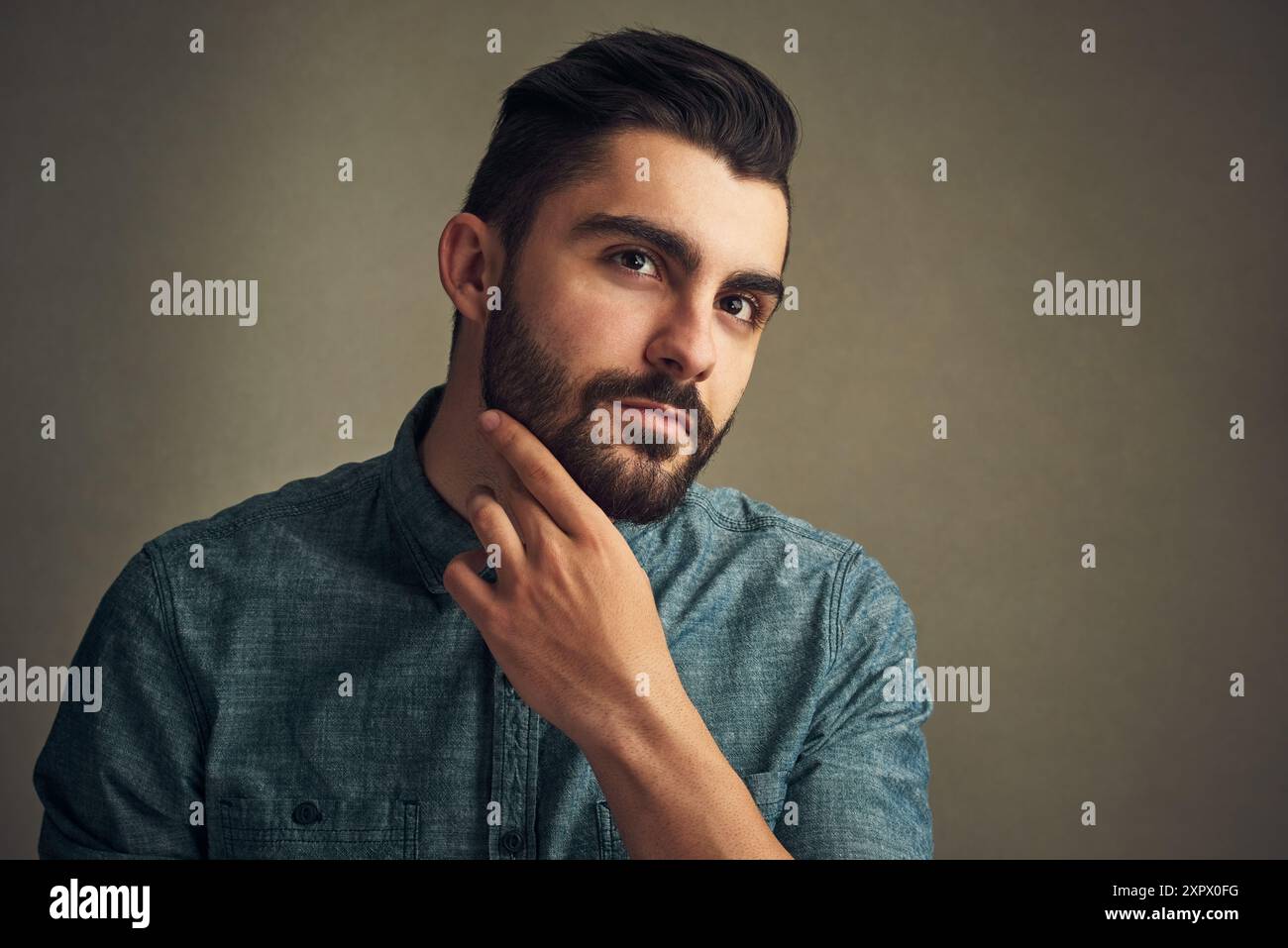 Beard, man and thinking in studio for style, date preparation and daily ...
