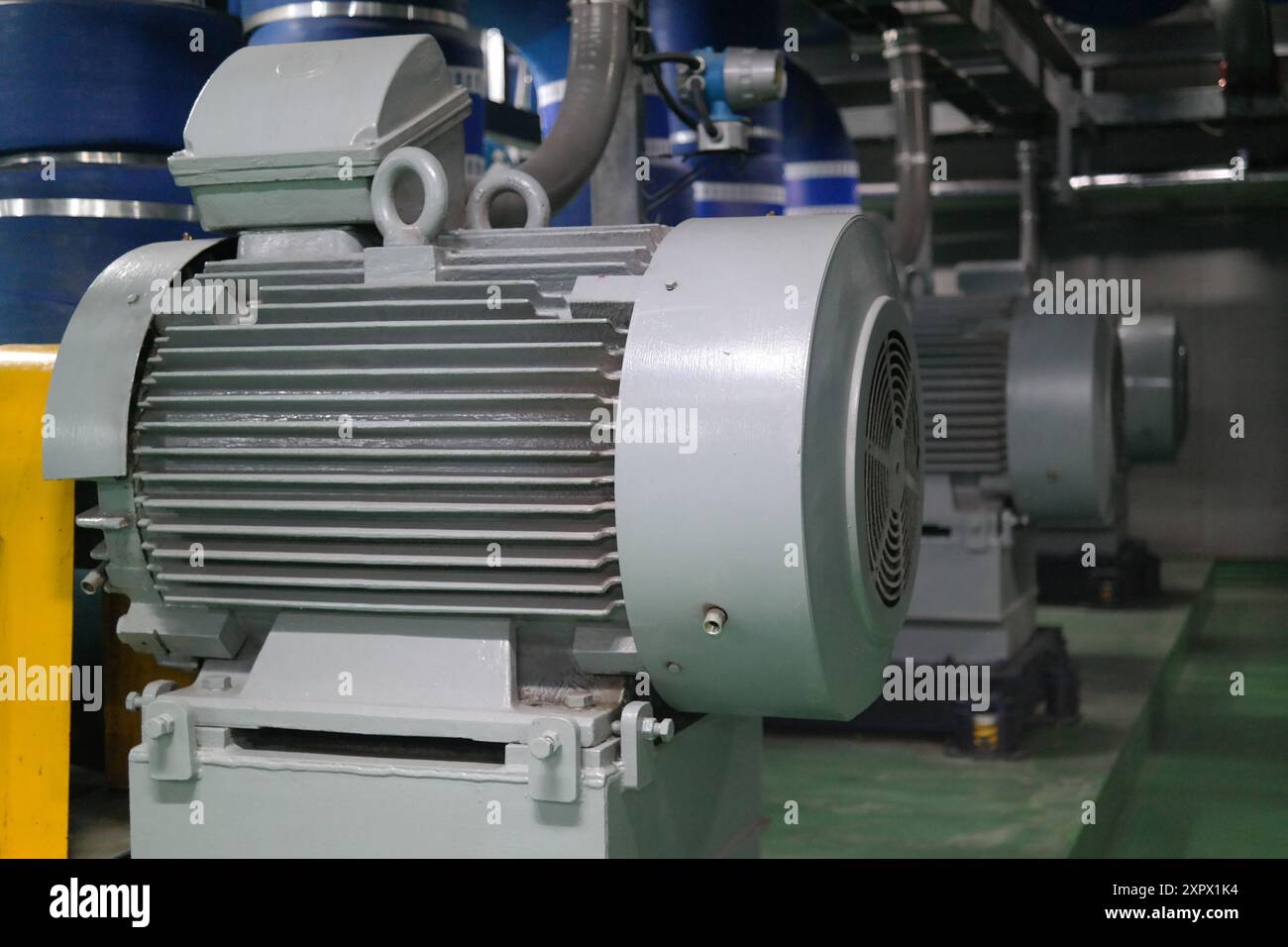 Industrial electric motors in a power plant, closeup of photo Stock ...
