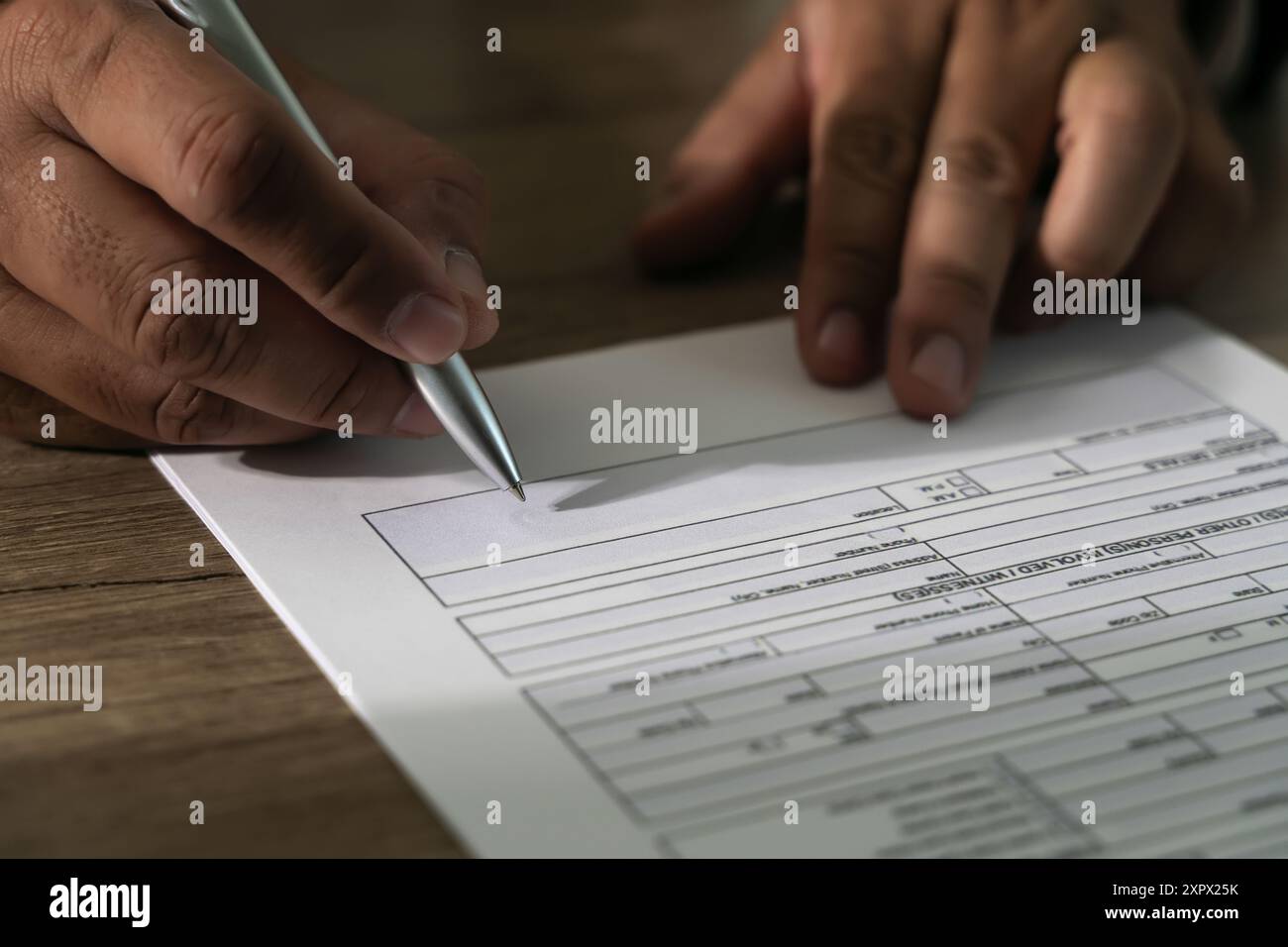 Male client signing agreement on hi-res stock photography and images ...