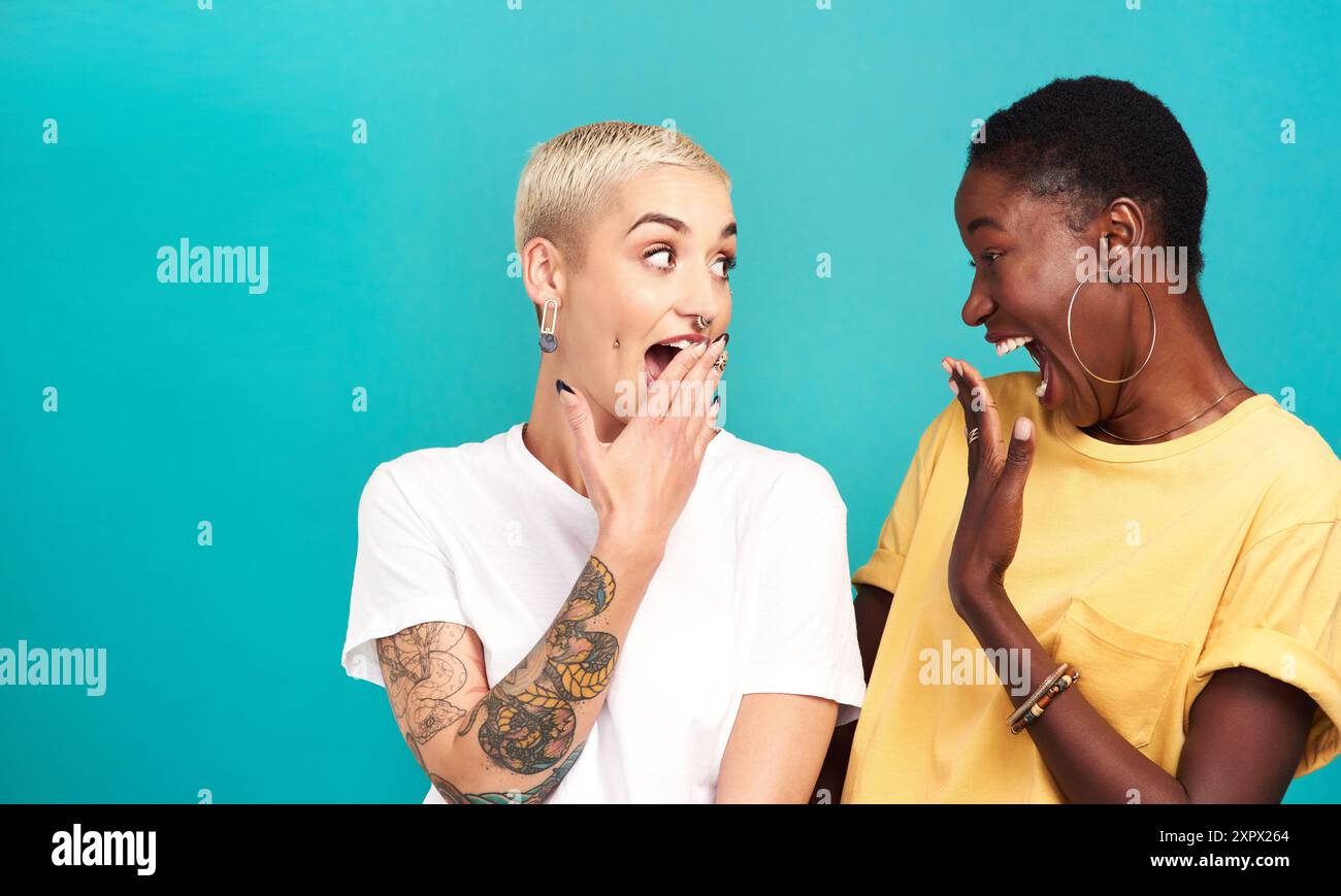 Girls, wow and expression with surprise, together and bonding on blue ...