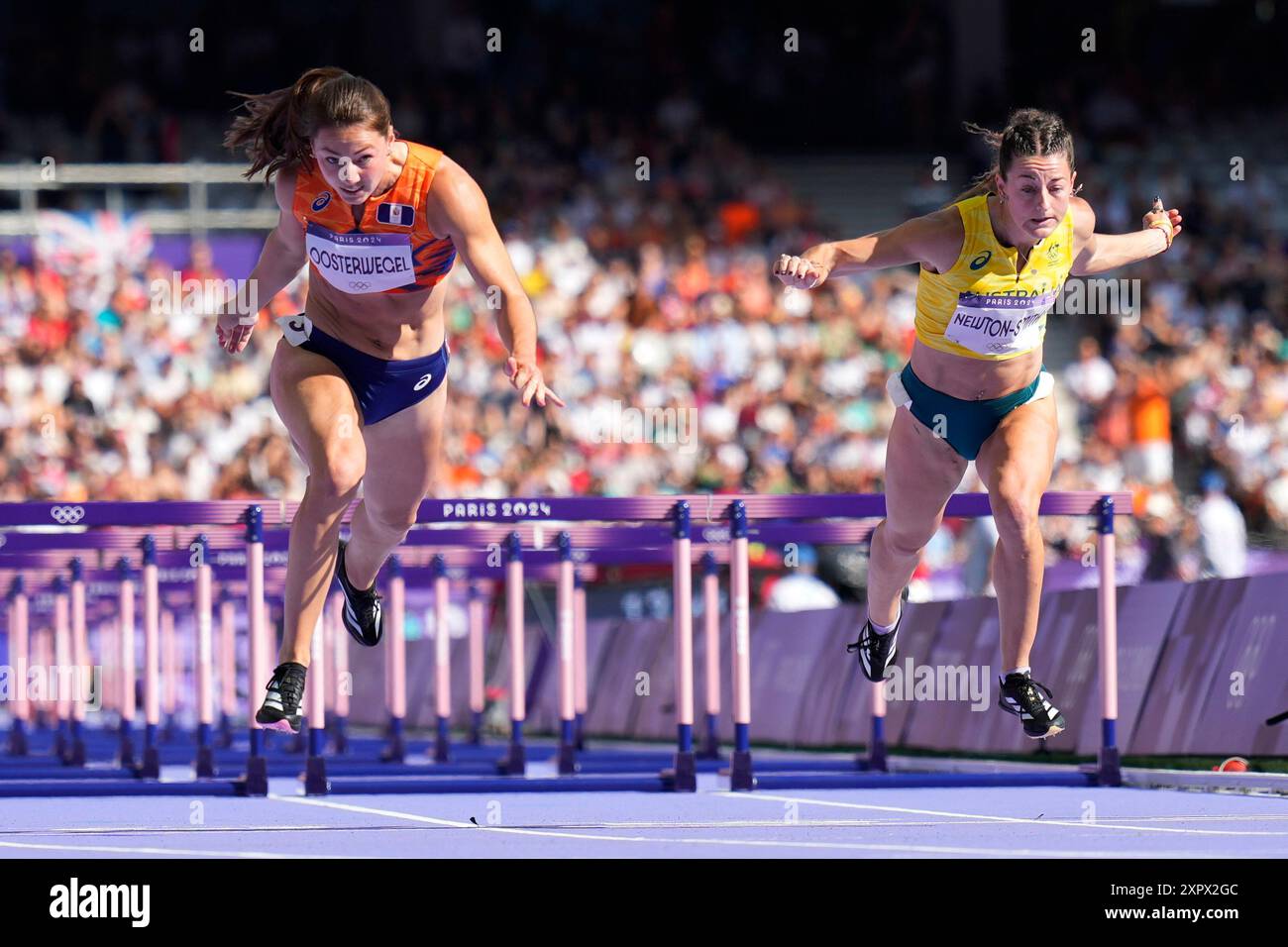 Emma Oosterwegel, left, of the Netherlands, Camryn Newton-Smith, of Australia, compete in the ...
