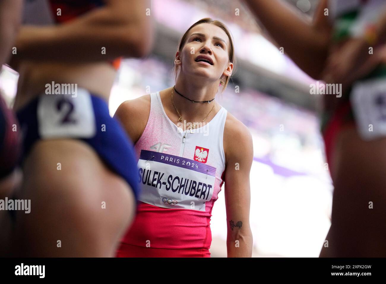 Adrianna Sulek-Schubert, of Poland, reacts after her women's heptathlon ...