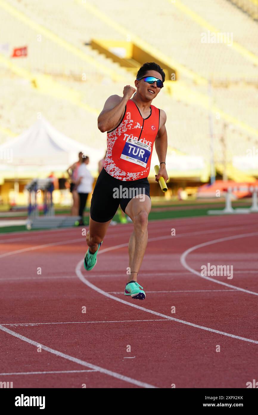 IZMIR, TURKIYE - MAY 25, 2024: Undefined athlete running 4x400 metres ...