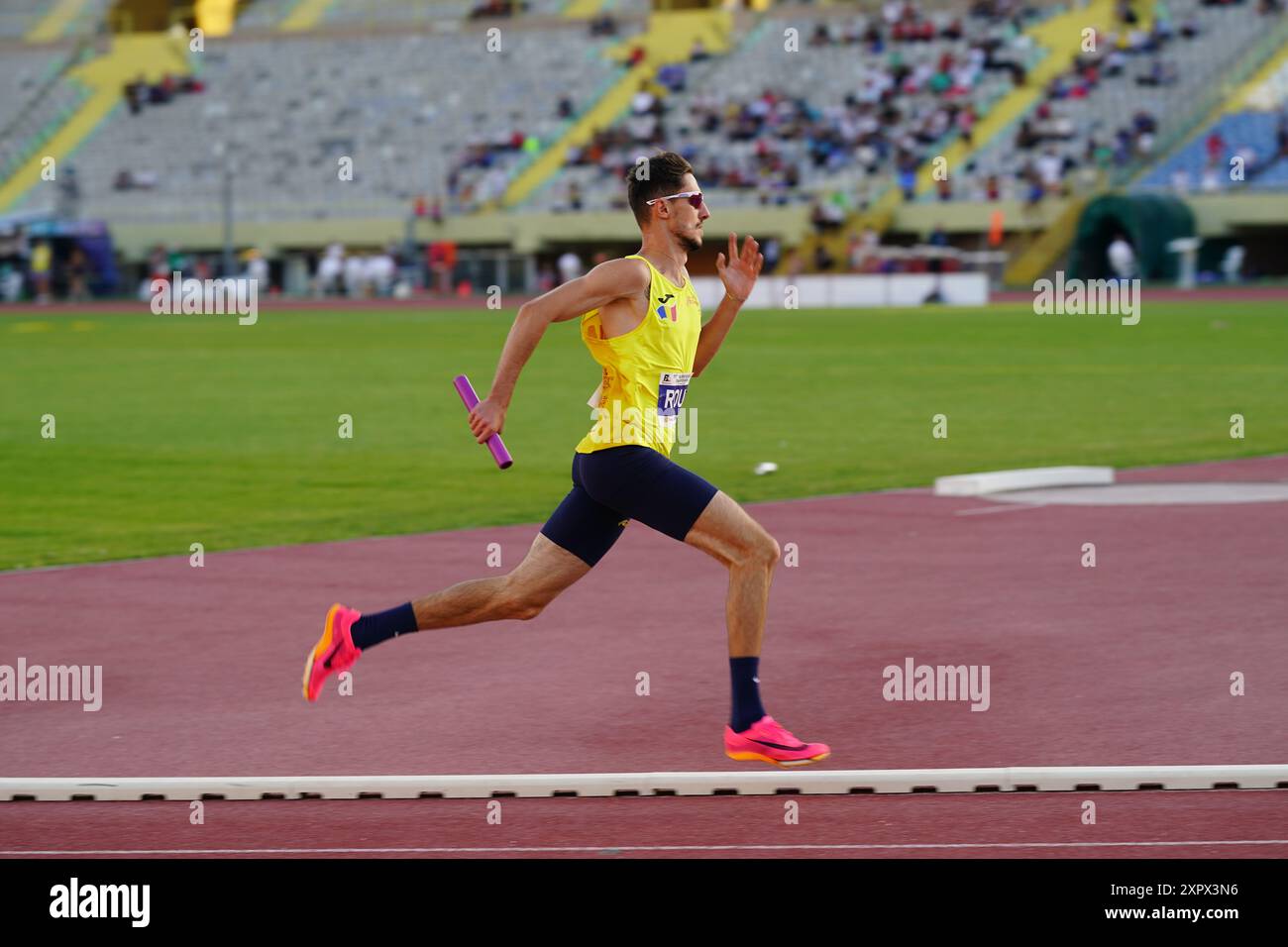 IZMIR, TURKIYE - MAY 25, 2024: Undefined athlete running 4x400 metres ...
