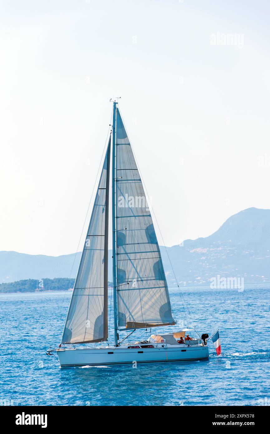 Corfu, Greece, sailboat in the Corfu Strait Stock Photo - Alamy