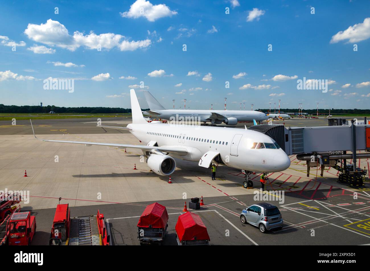 Several airplanes at the airport Stock Photo - Alamy