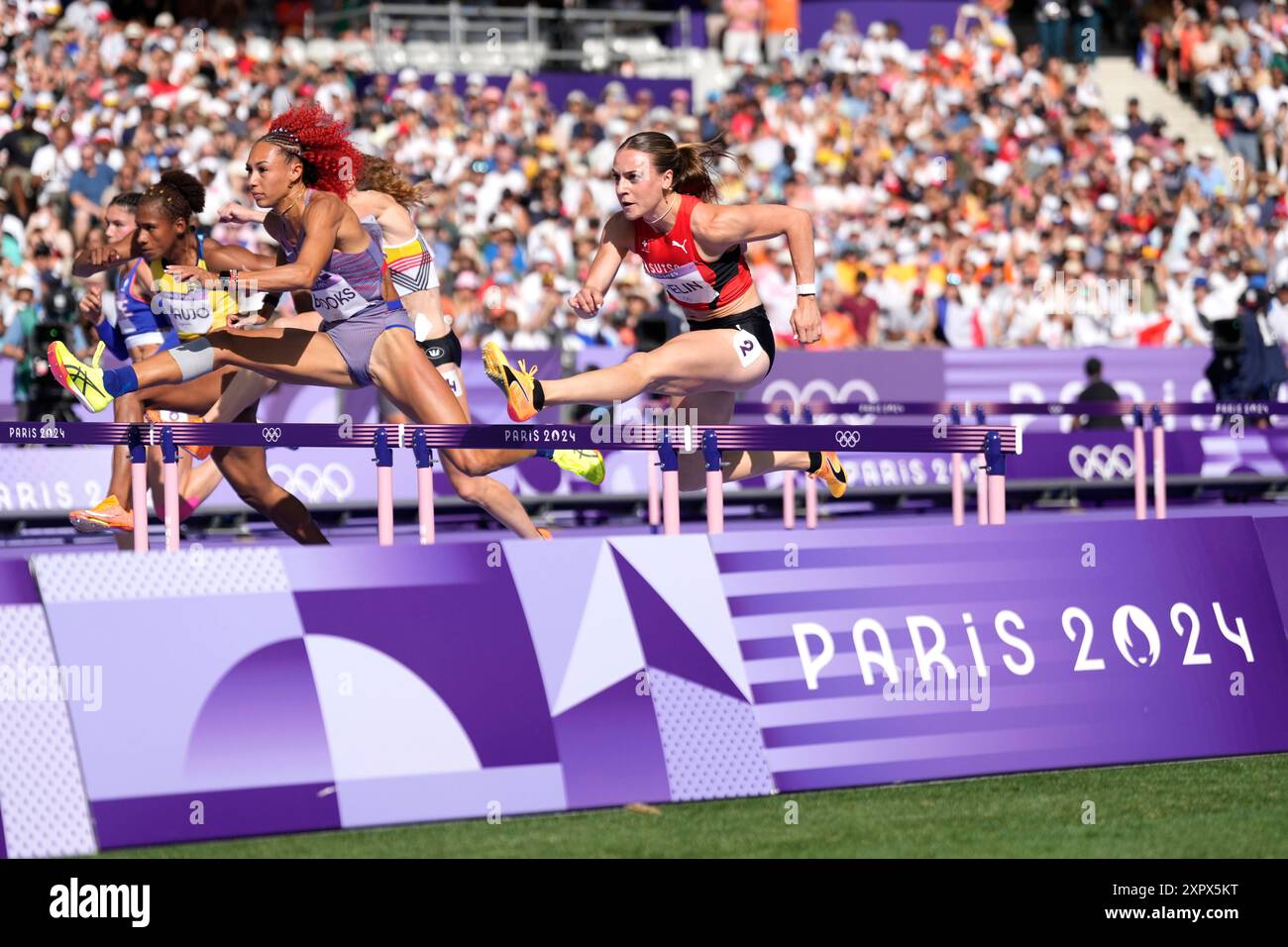 Taliyah Brooks, second from right, of the United States, competes ...