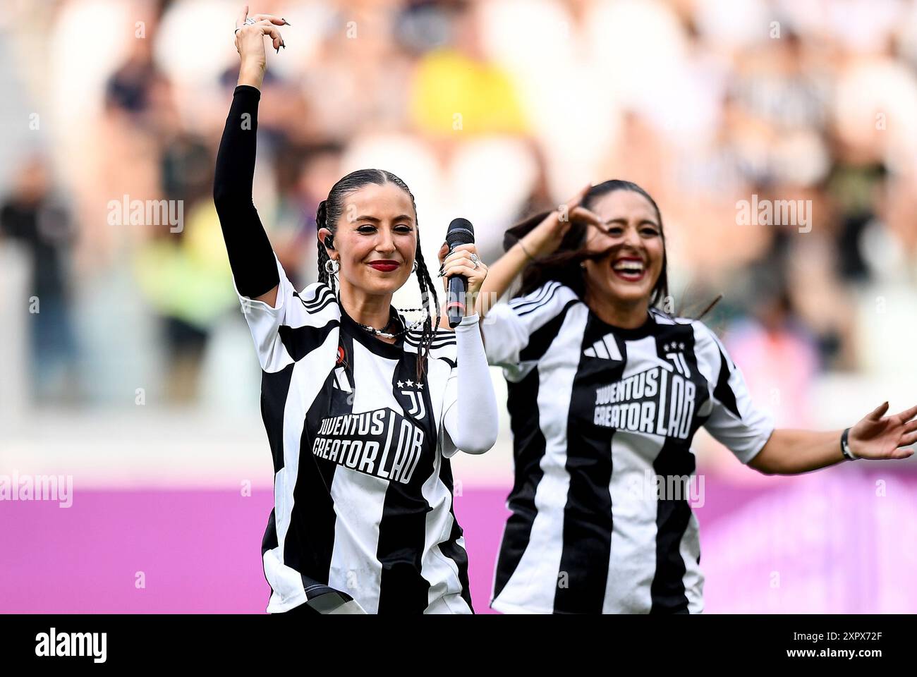 American Pop singer Tia Tia performs prior to kick off in the Pre-season friendly match between ...