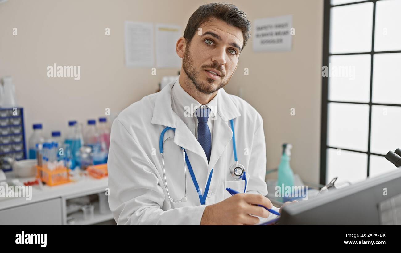 Handsome hispanic man with beard wearing lab coat and stethoscope in ...
