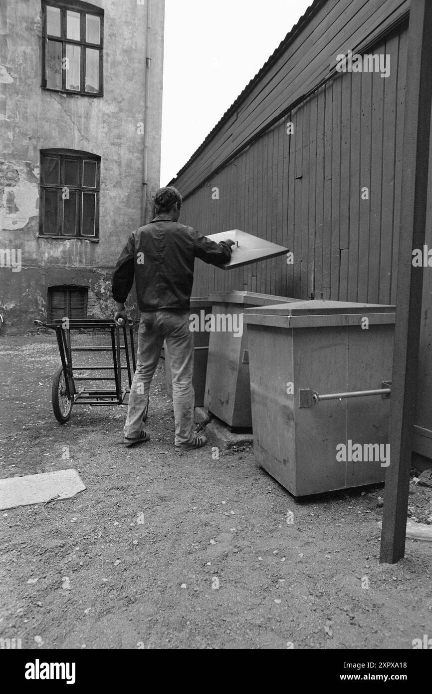 Garbage bins apartment building Black and White Stock Photos & Images ...