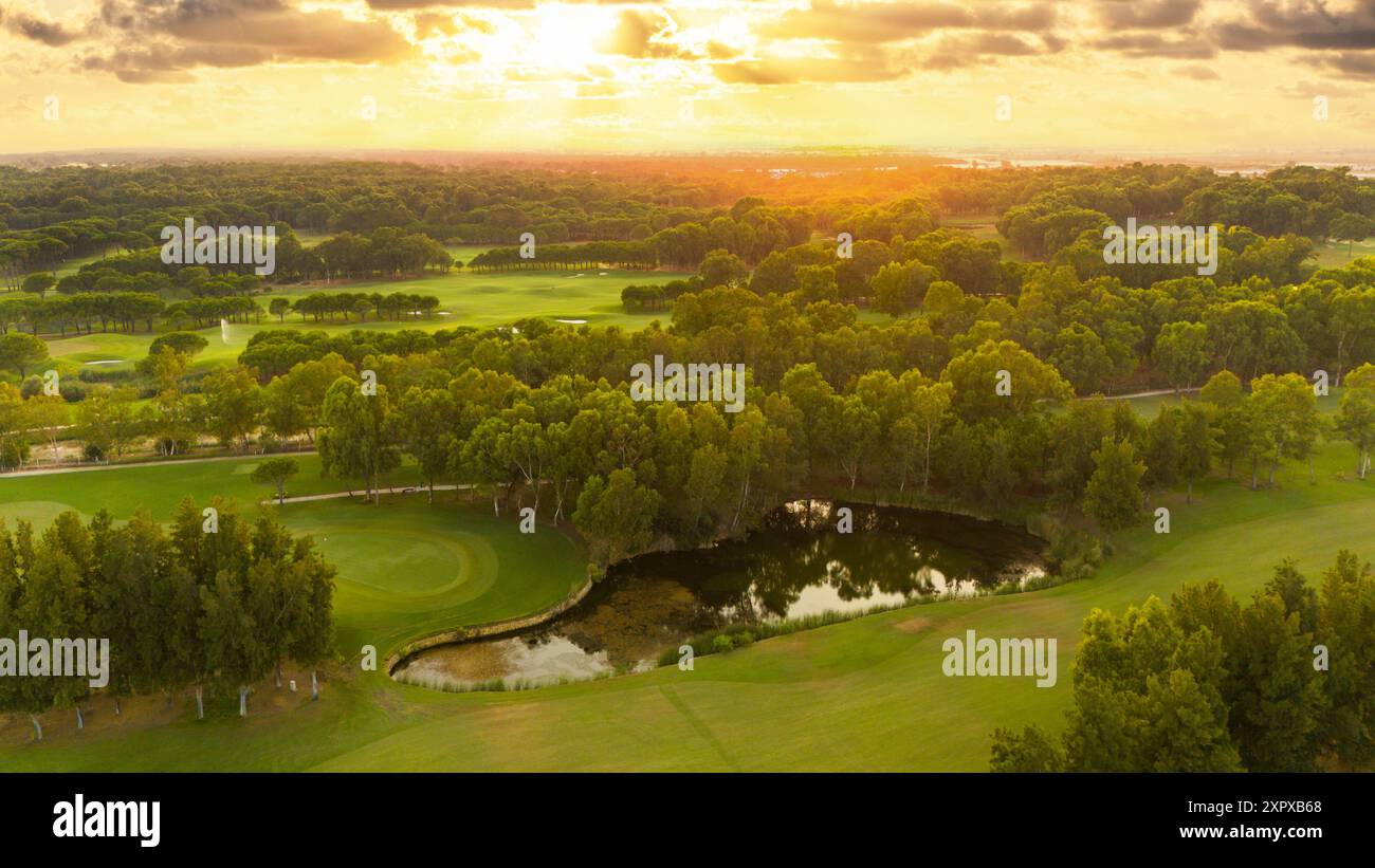 Aerial panoramic view of golf course during sunset Stock Photo - Alamy