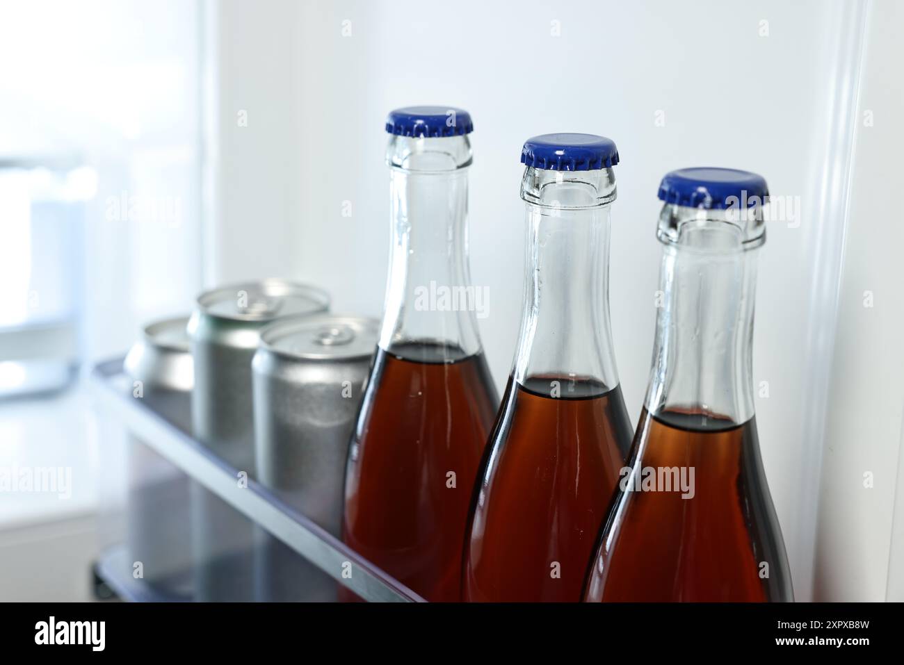 Many different cold drinks in refrigerator, closeup Stock Photo - Alamy