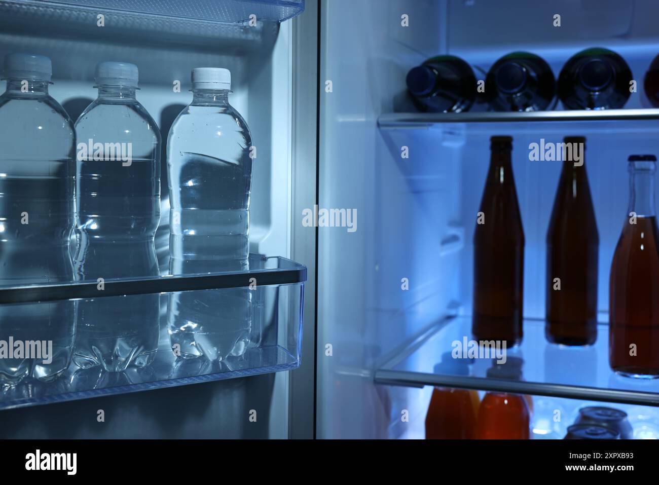 Many different cold drinks in refrigerator, closeup Stock Photo - Alamy