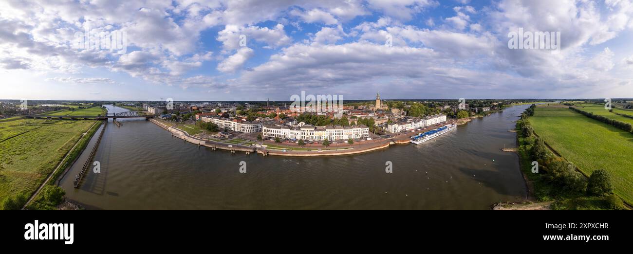 Hanseatic medieval tower town Zutphen seen from across the river IJssel ...