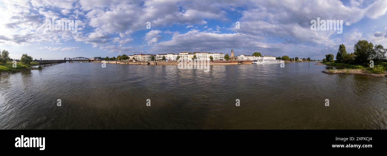 Hanseatic medieval tower town Zutphen seen from across the river IJssel ...