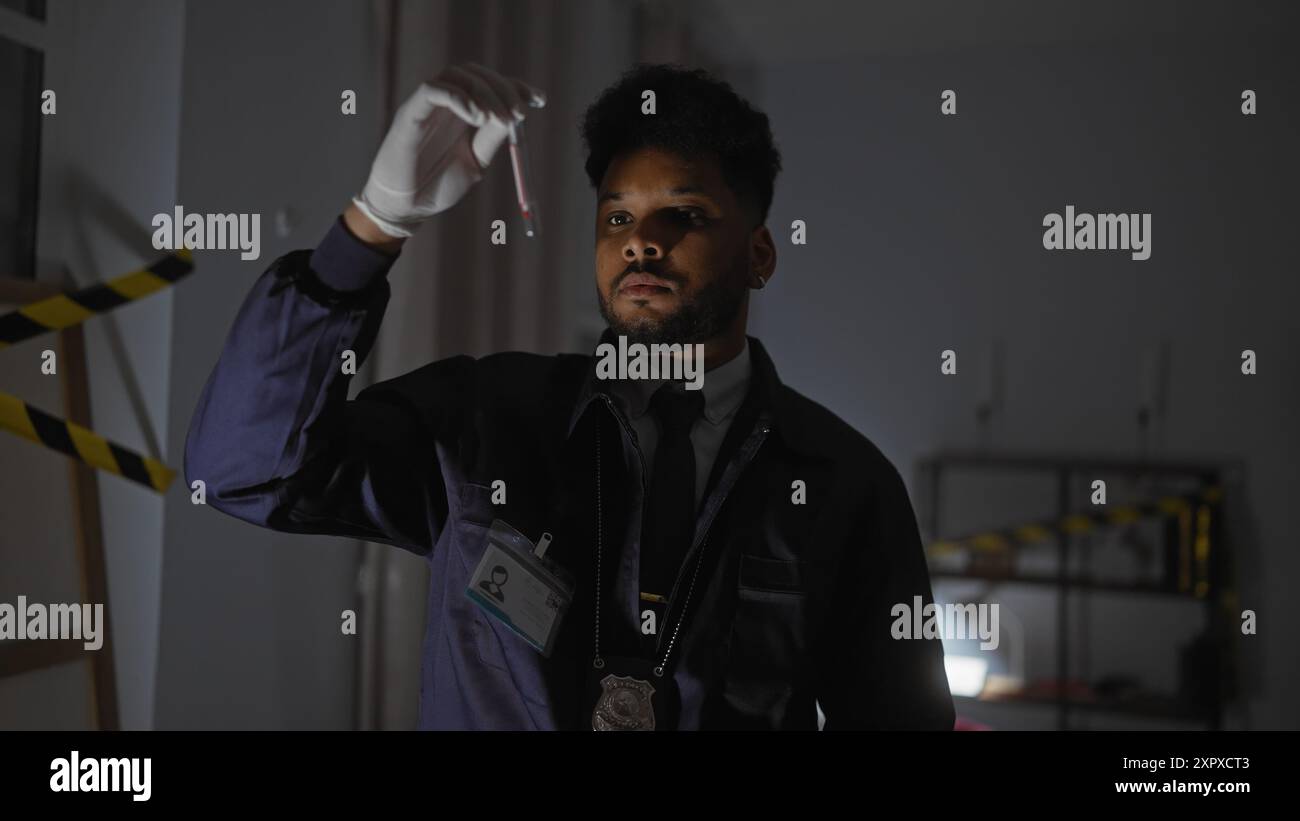 A focused african american detective analyzes evidence indoors at a ...