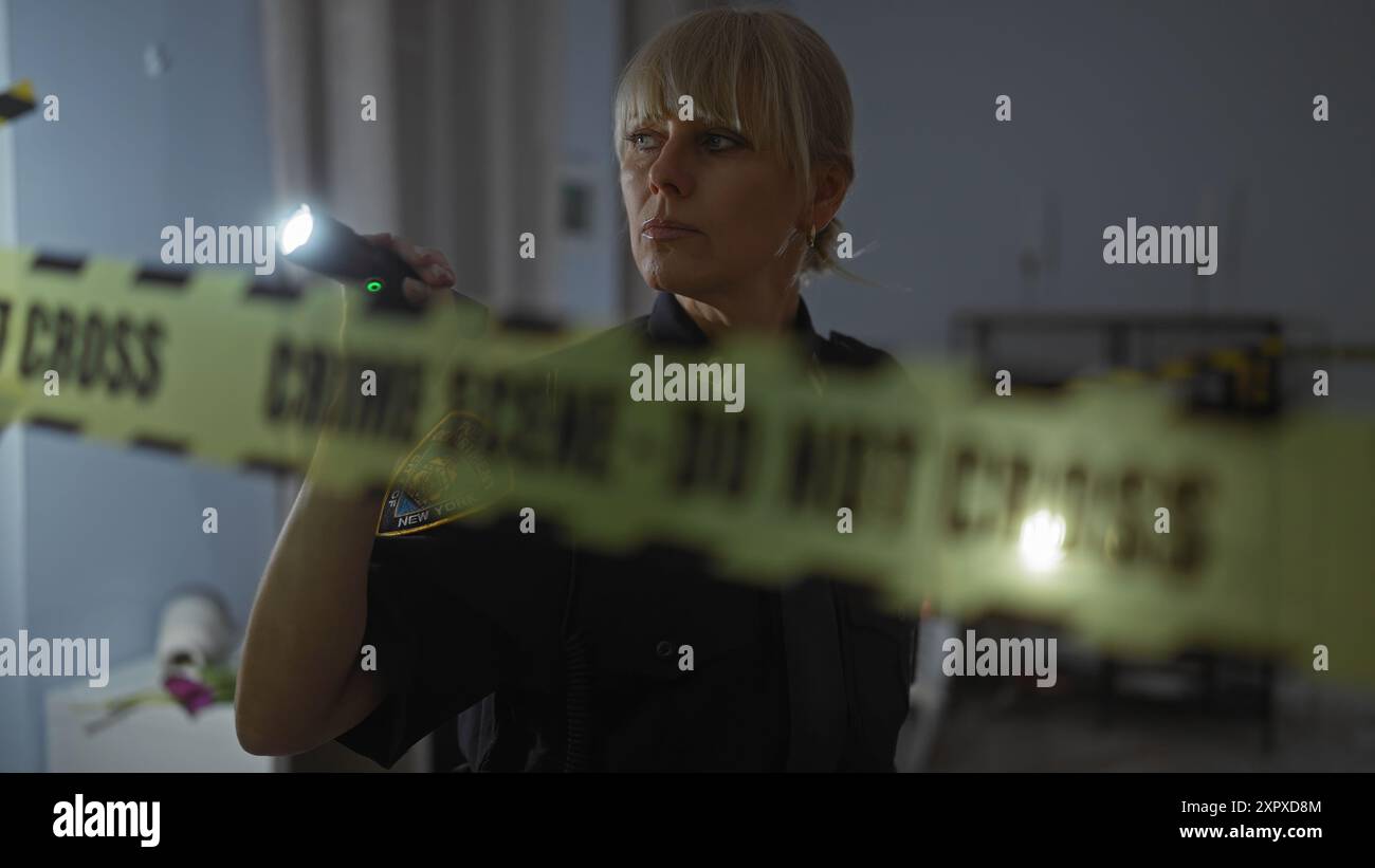 Caucasian woman detective examines a crime scene indoors with ...