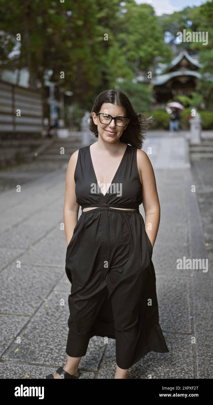 Confident hispanic woman, beautiful and joyful, cheerfully posing with ...