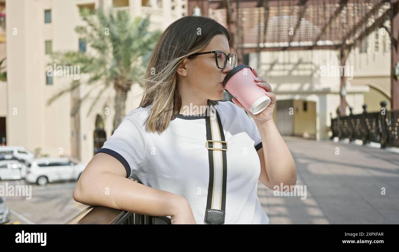 Beautiful young woman sips coffee hi-res stock photography and images ...