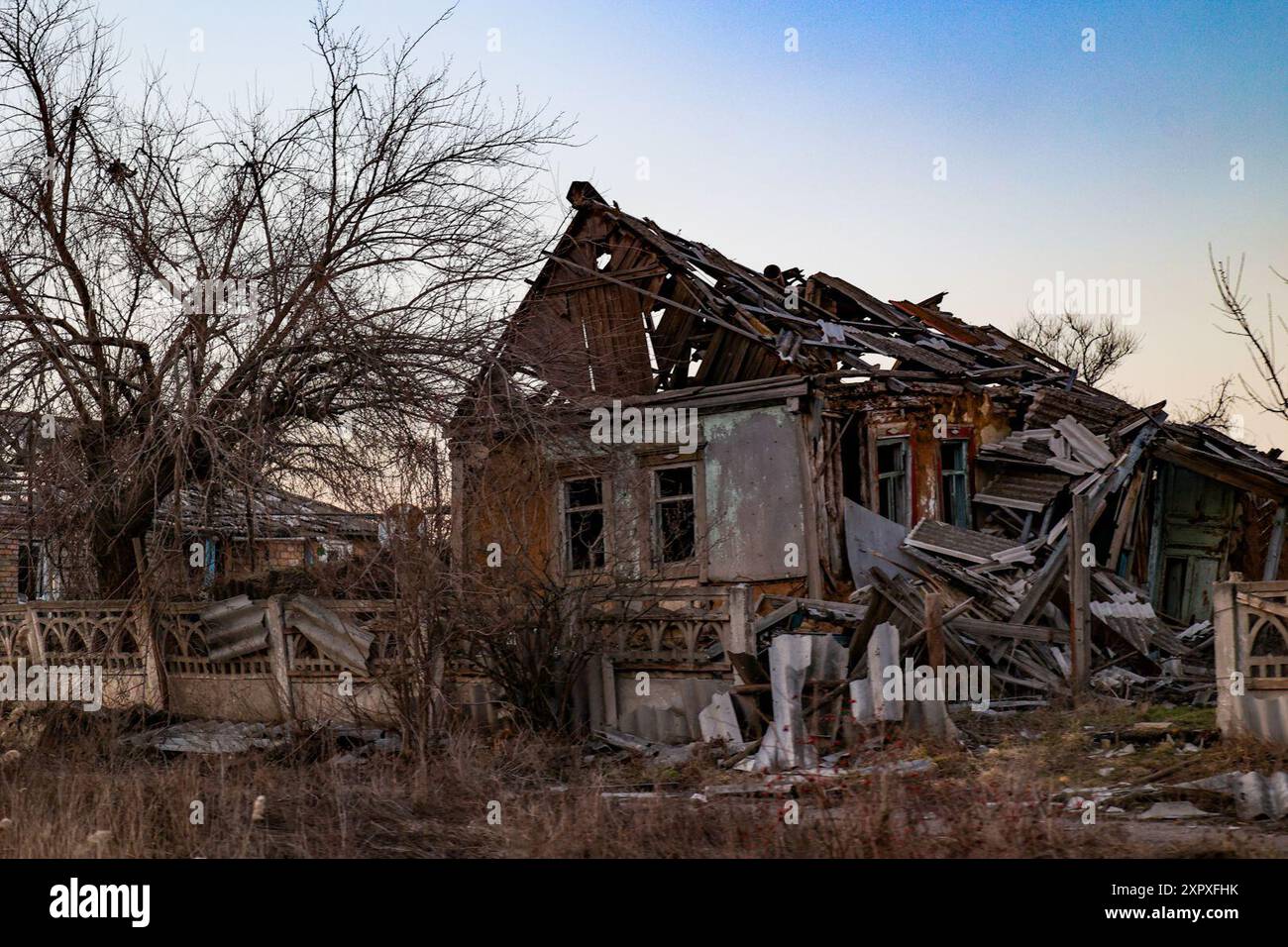 Civilian Infrastructure Damage in Lyman. Shelled houses line the road ...