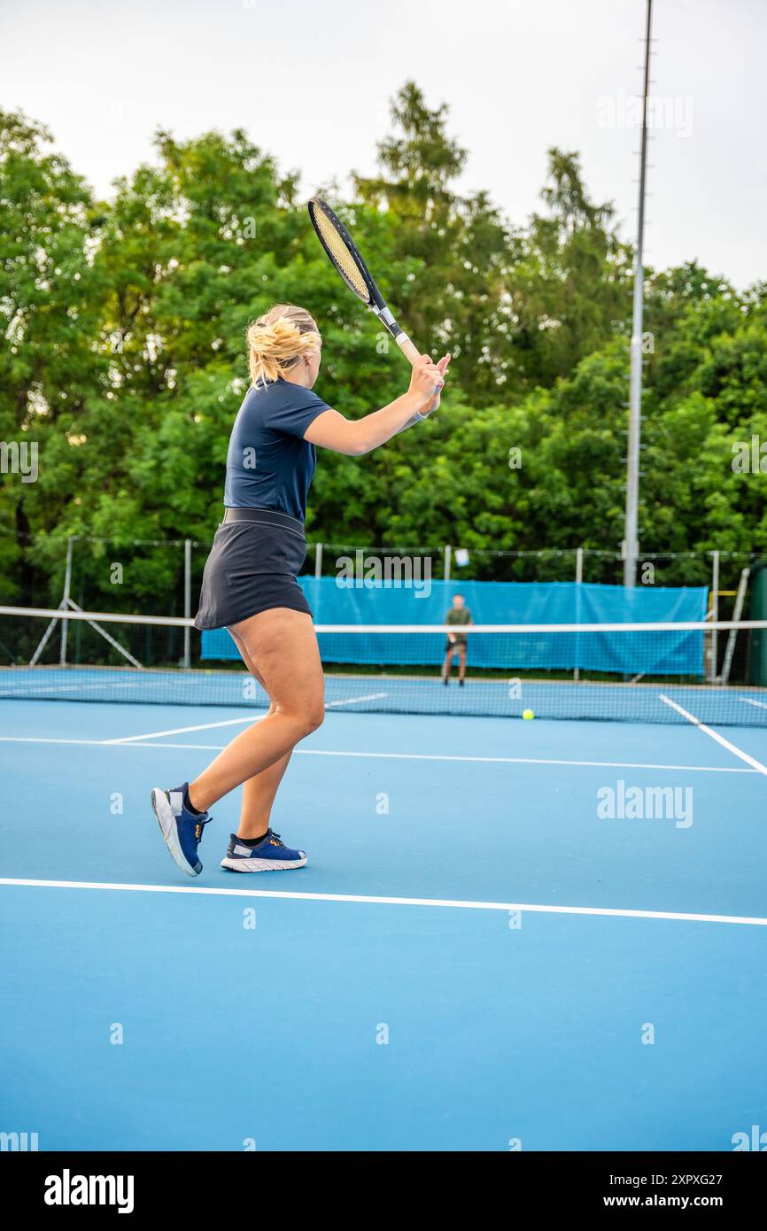 Professional tennis players playing the tennis on outside court Stock ...