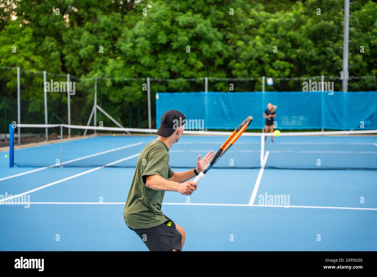 Professional tennis players playing the tennis on outside court Stock ...
