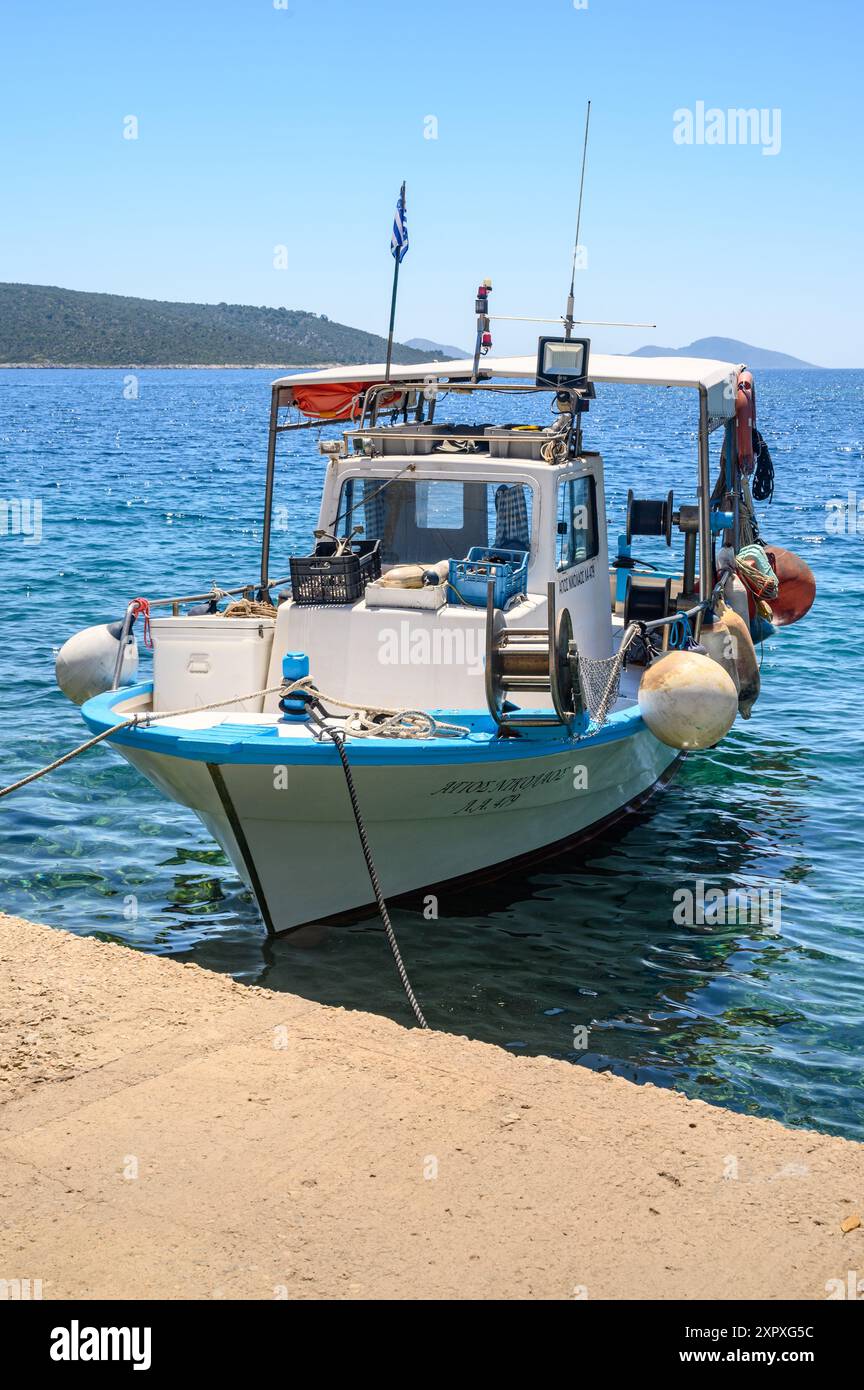 Fishing boat moored up at Steni Vala on Alonissos island Greece Stock ...
