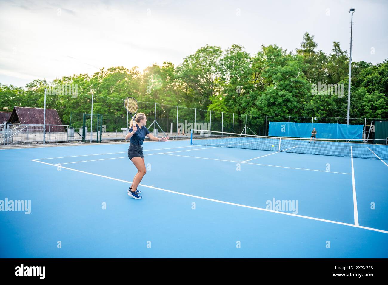 Professional tennis players playing the tennis on outside court Stock ...