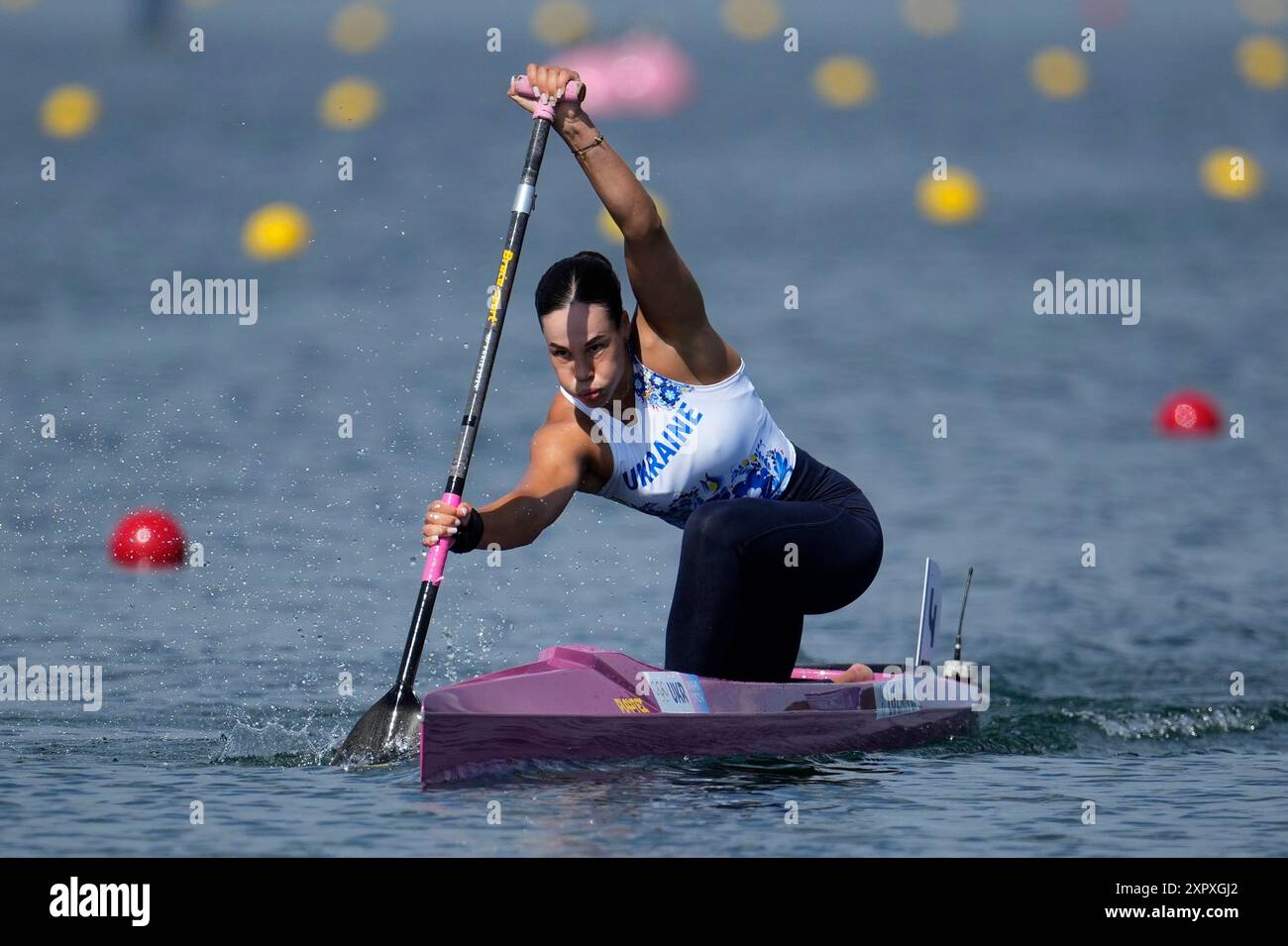 Liudmyla Luzan, of Ukraine, competes in the women's canoe single 200 ...