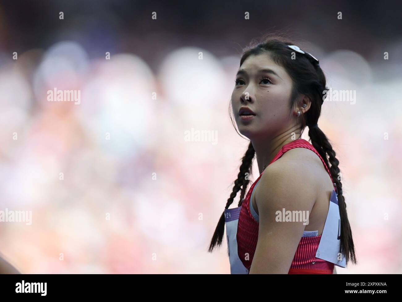 Paris, France. 8th Aug, 2024. Wu Yanni of China reacts after the women's 100m hurdles repechage ...