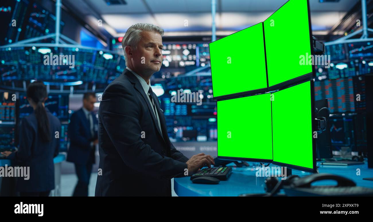 Financial Analyst Using a Desktop Computer with Multi-Monitor ...