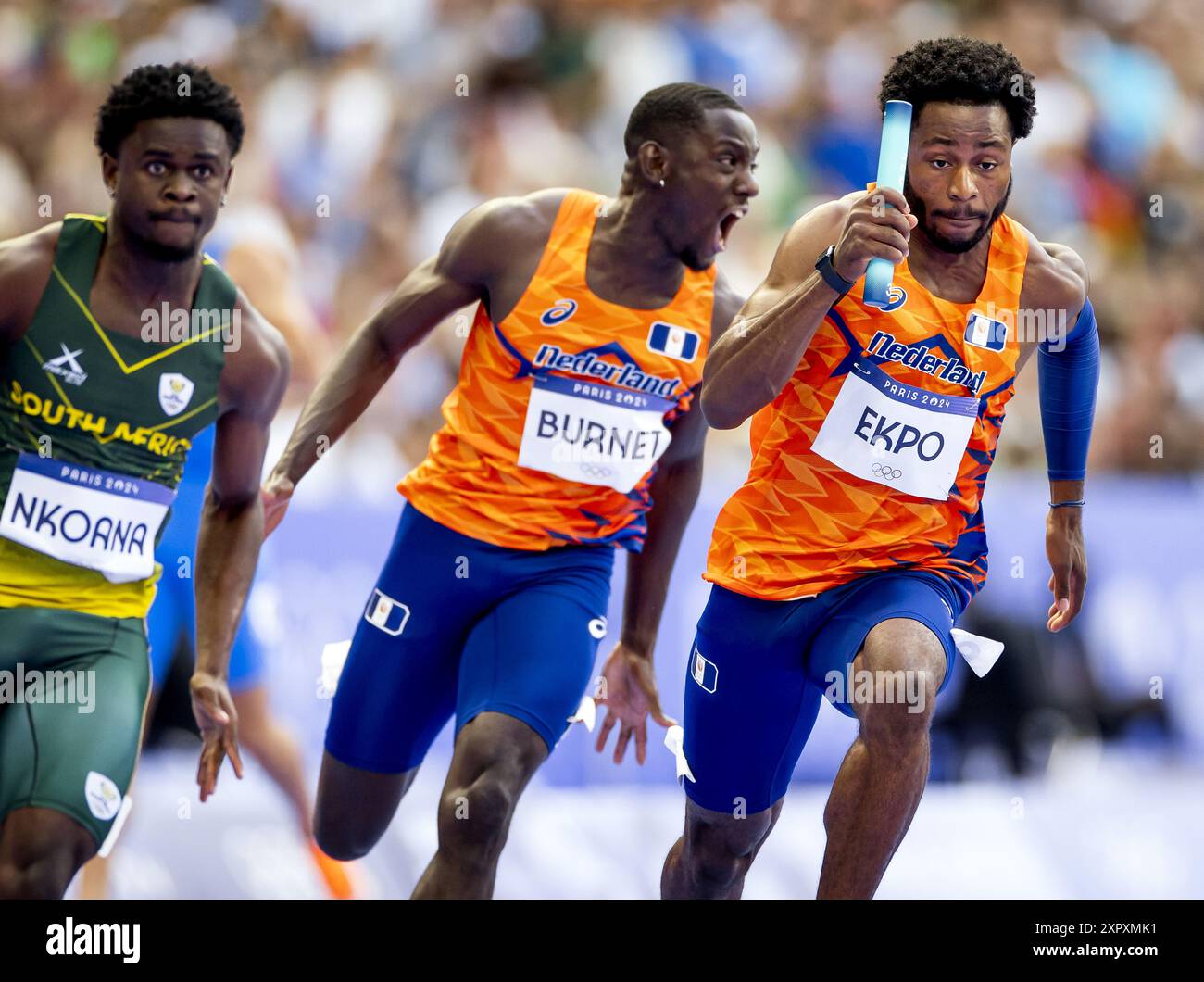 PARIS - Taymir Burnet and Nsikak Ekpo in action in the 4x100m relay ...