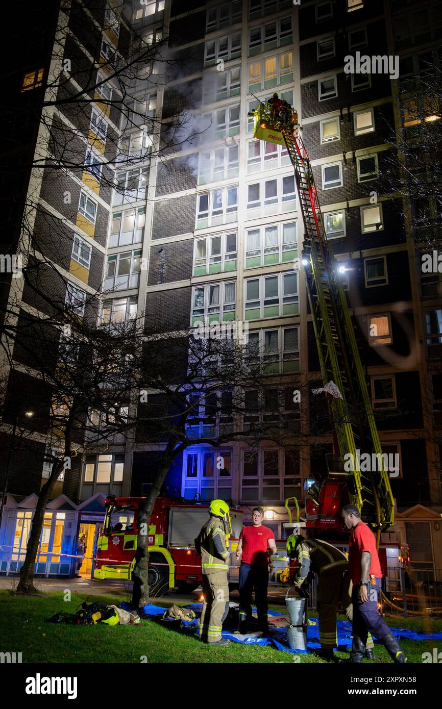 A London residential tower block on fire is attended by the London Fire ...
