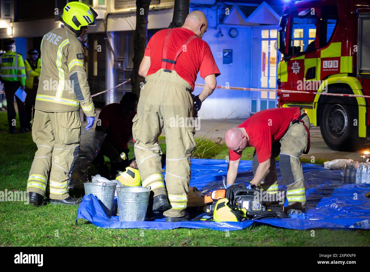 A London residential tower block on fire is attended by the London Fire ...