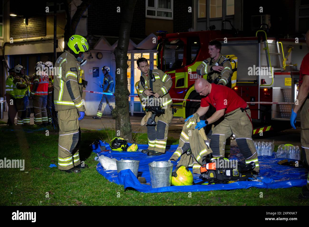 A London residential tower block on fire is attended by the London Fire ...
