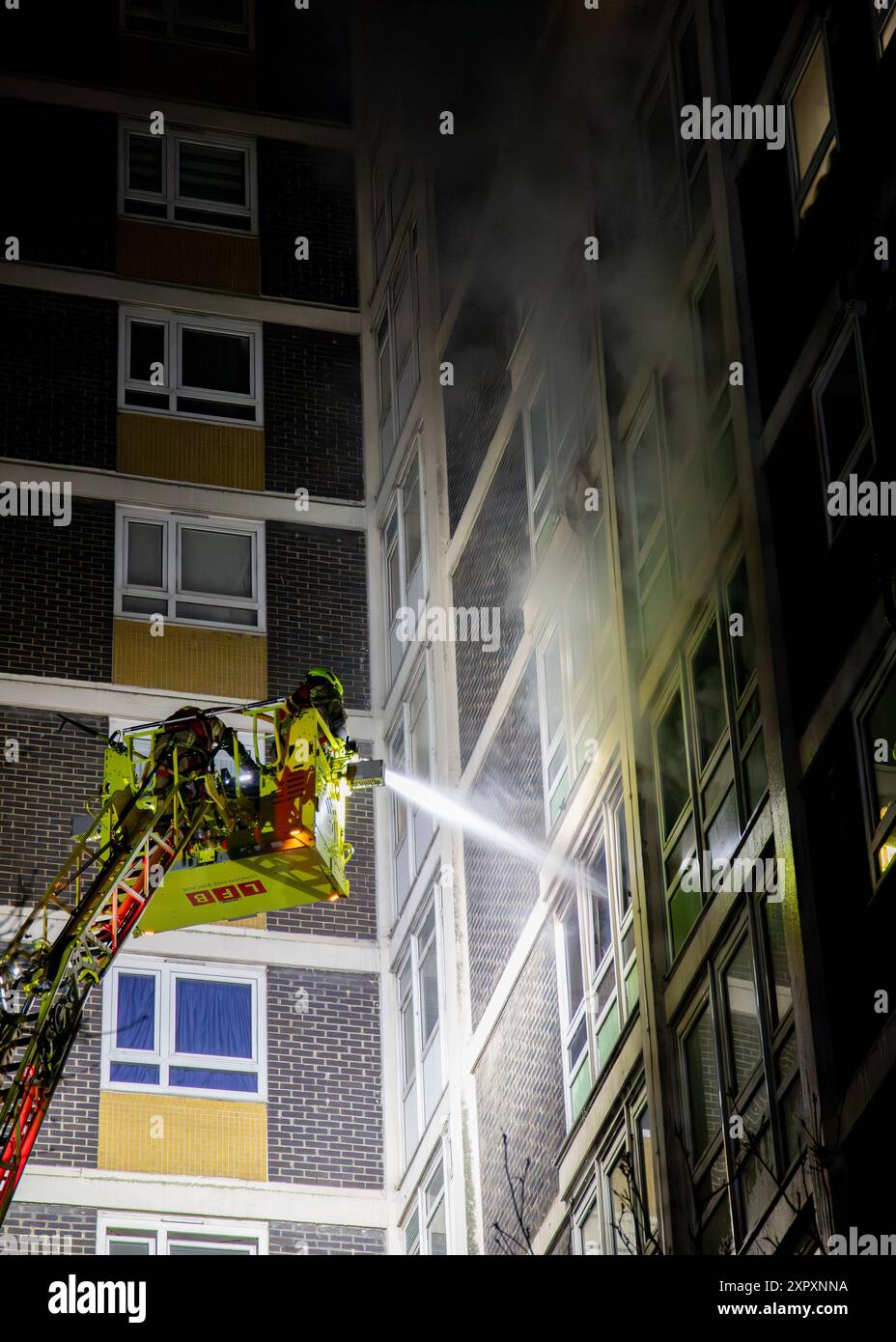 A London residential tower block on fire is attended by the London Fire ...