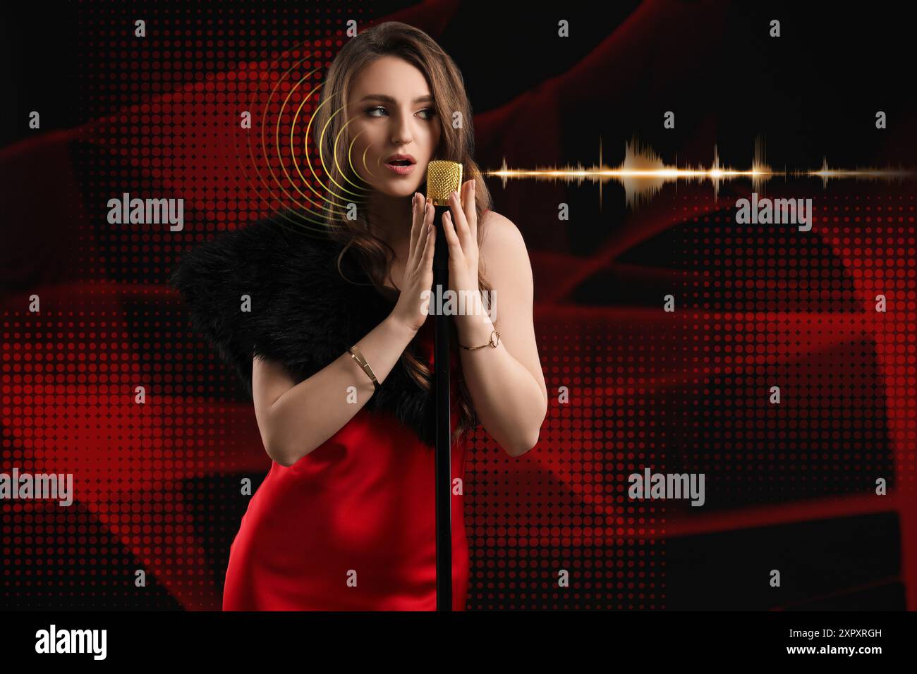 Beautiful woman with microphone singing on dark background. Audio ...