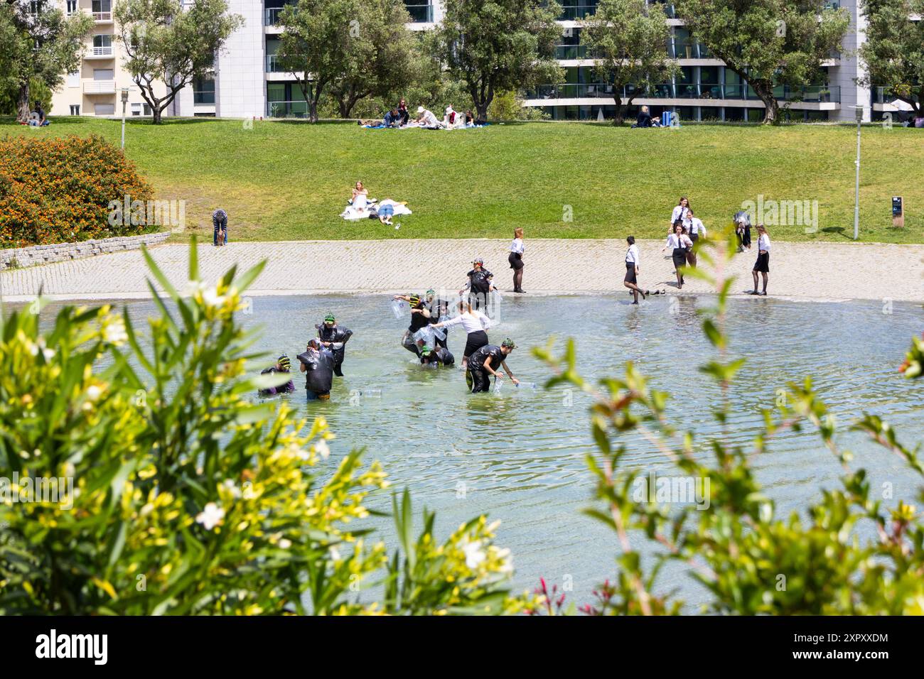 Group people collecting garbage in hi-res stock photography and images ...