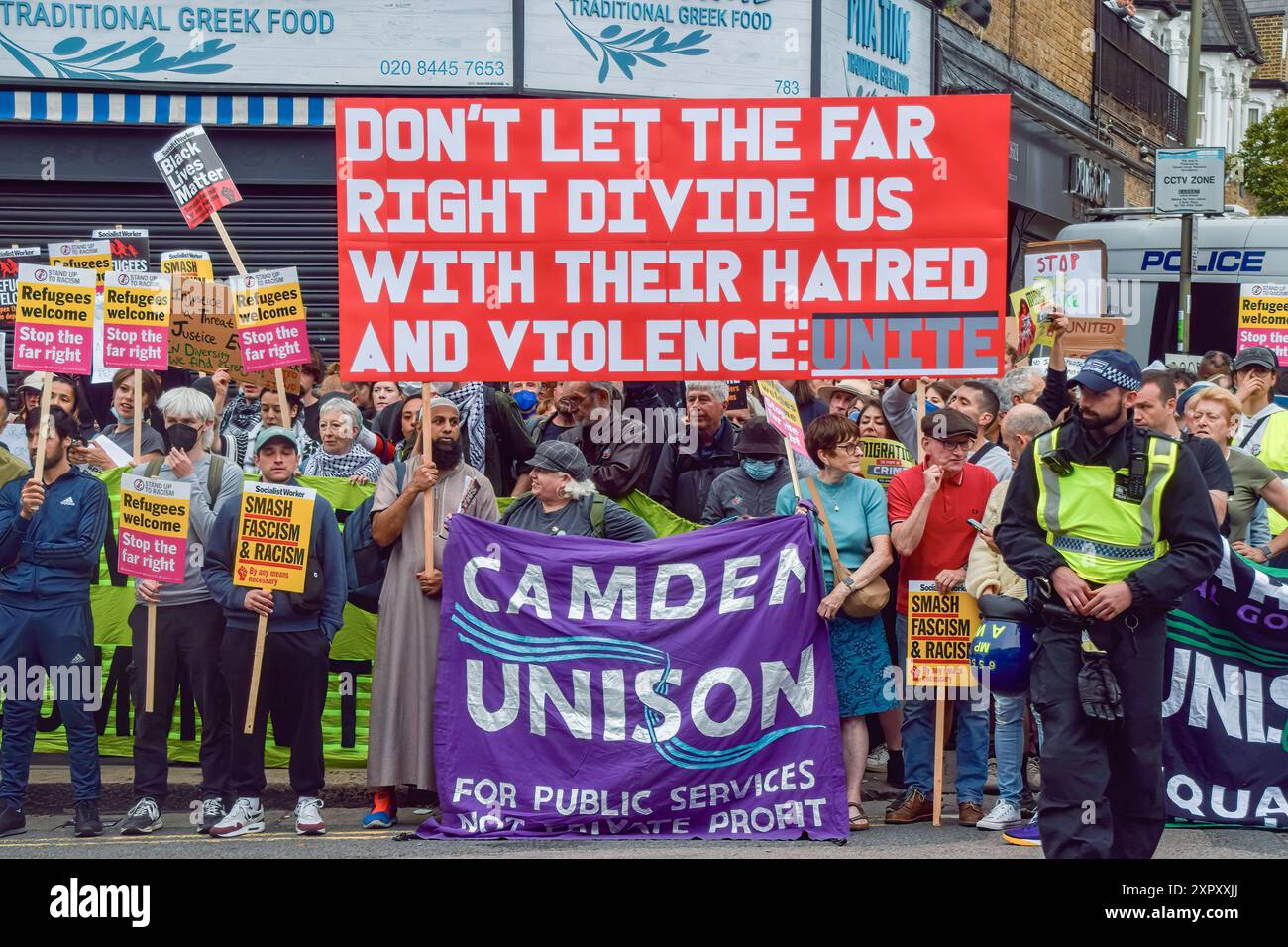 London, UK. 07th Aug, 2024. Protesters hold anti-far-right and anti ...