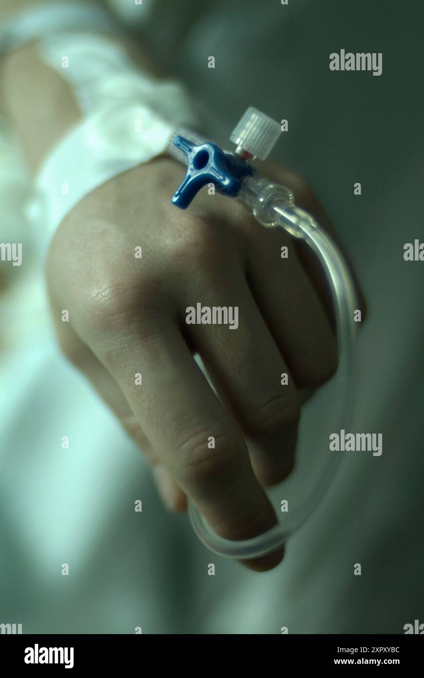 Hospitalized patient with IV drip Stock Photo - Alamy