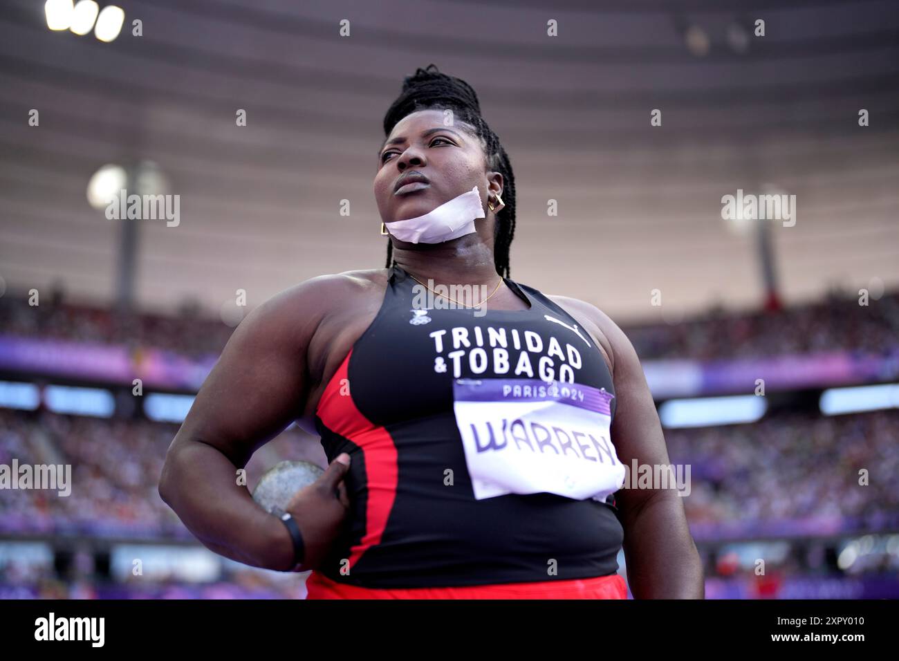 Portious Warren, of Trinidad And Tobago, pauses while competing during ...
