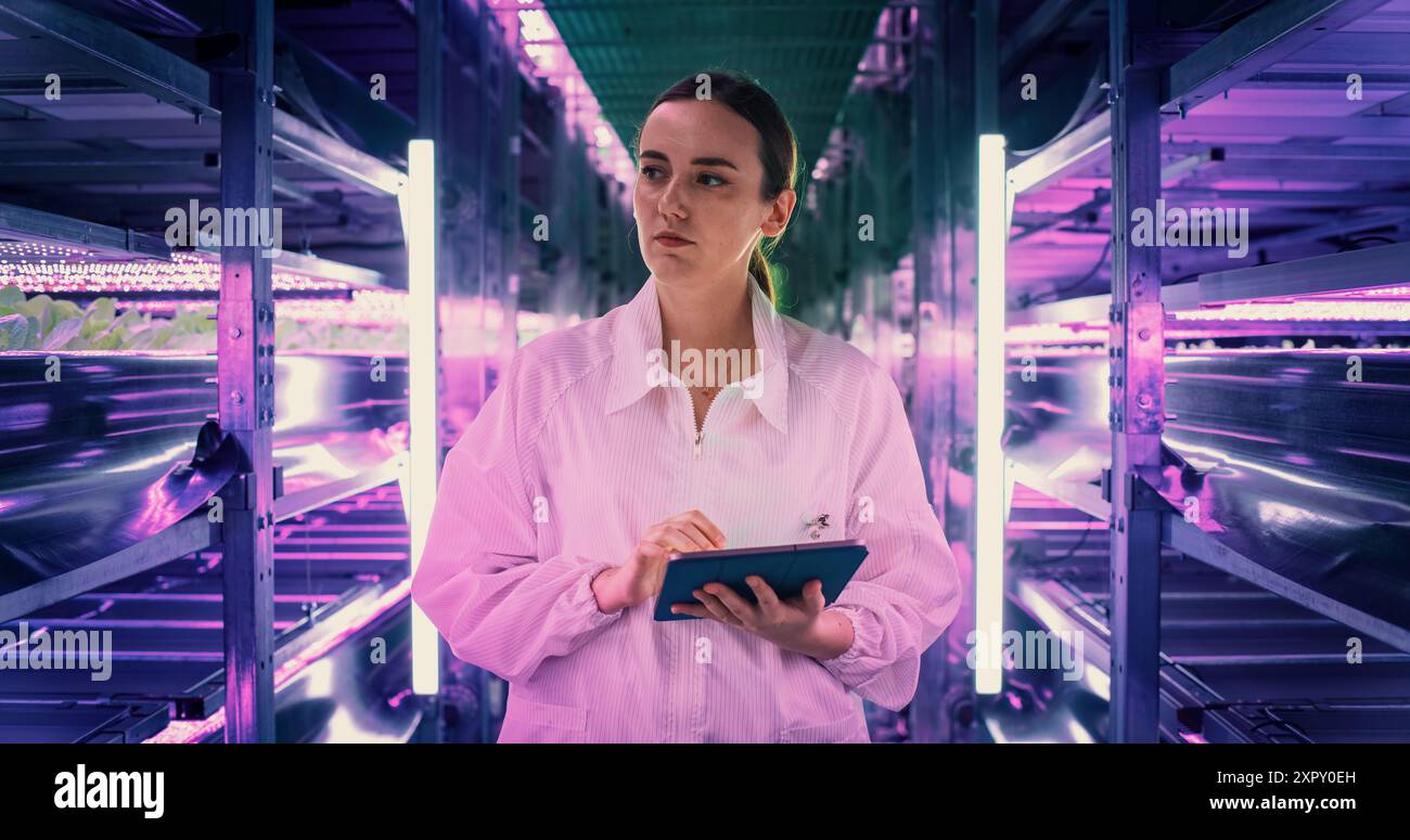 Portrait of Female Agricultural Engineer Walking in Vertical Farm ...