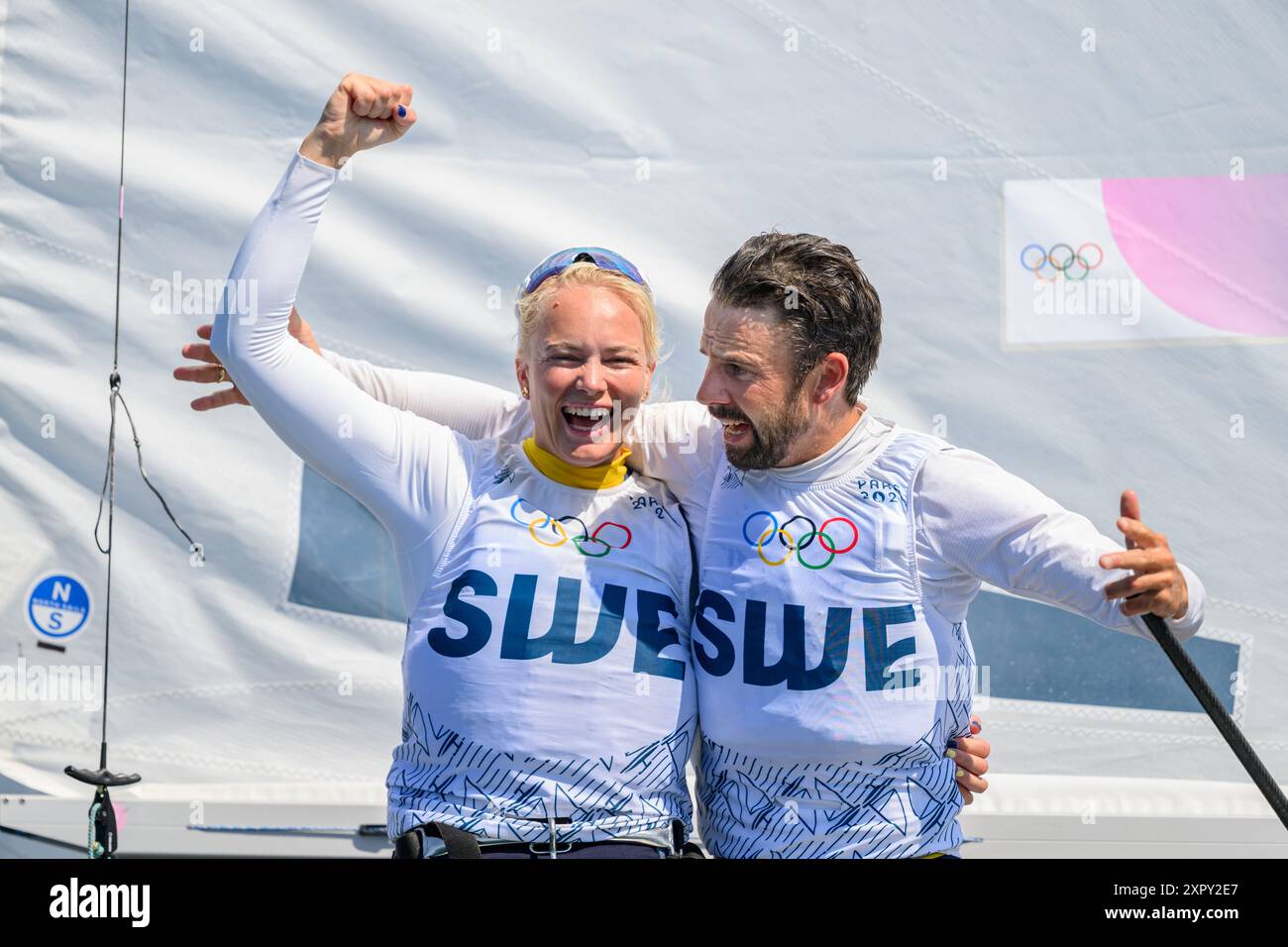 Anton Dahlberg and Lovisa Karlsson of, Sweden. , . celebrate after mixed dinghy - 470 sailing ...