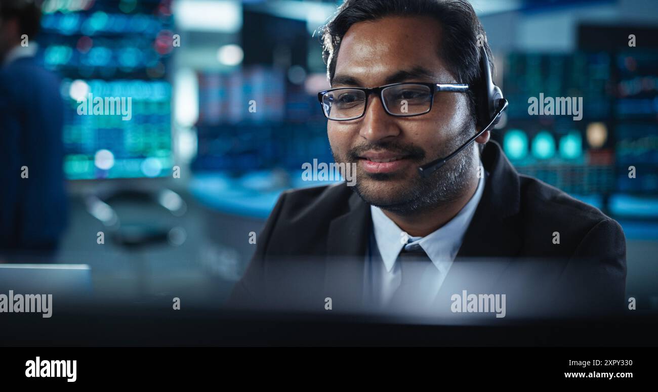 Portrait of a Young Indian Man Working in an International Stock ...