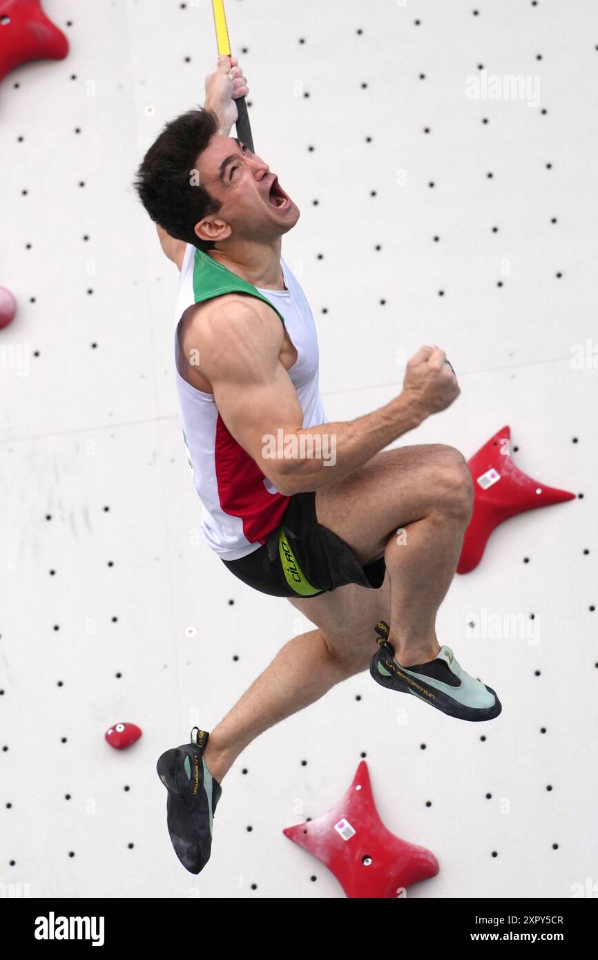 Reza Alipour Shenazandifard of Iran reacts as he competes in the men's ...