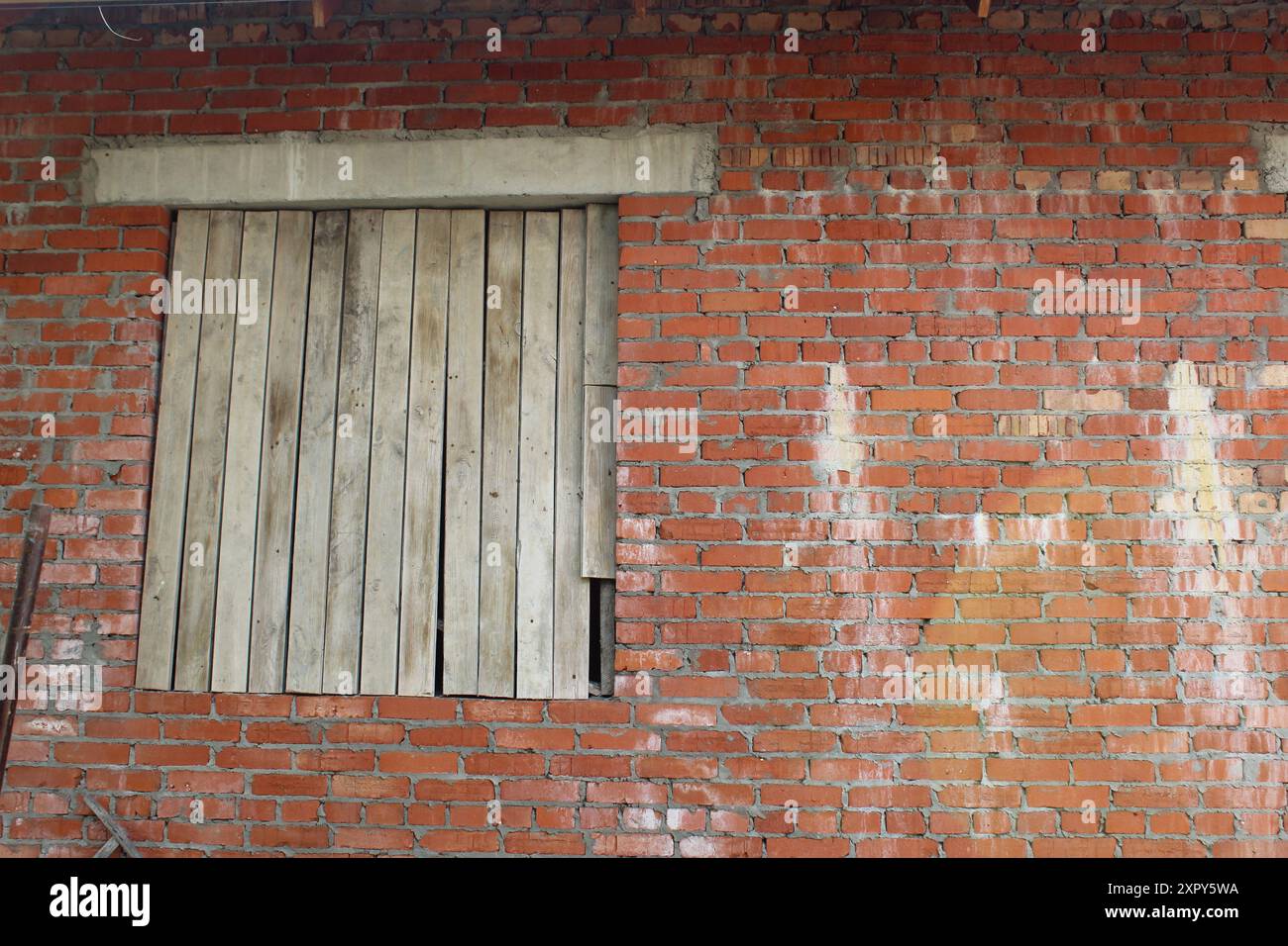 Boarded up window. abandoned and unfinished houses and buildings. Vacant buildings Stock Photo ...