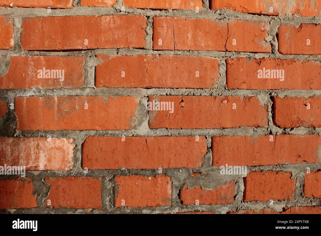 brick macro photo. Brick wall, close-up of red bricks with concrete ...