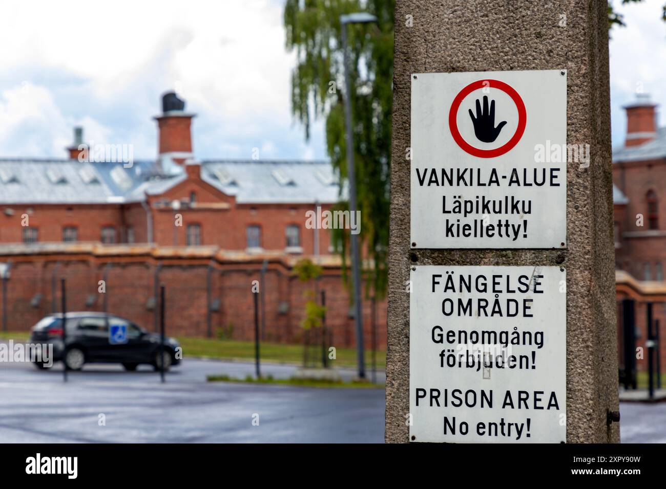 No-trespassing signs on stone post at the gate to the Helsinki Prison ...