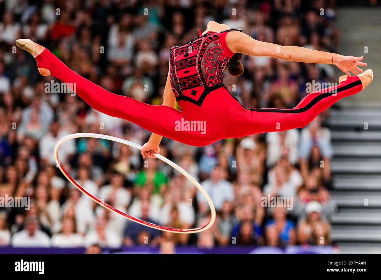 Taisiia Onofriichuk of Ukraine performs with the hoop during Individual ...